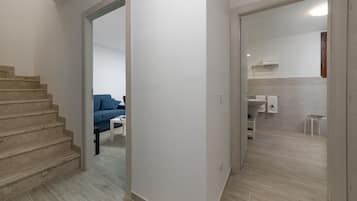 Apartamento, 2 quartos | Sala de estar | Televisor LCD