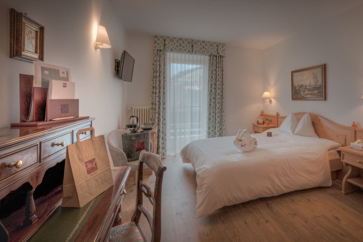 Quarto Individual | Minibar, secretária, quartos insonorizados, Wi-fi grátis 