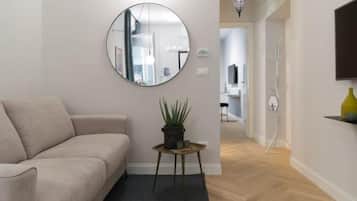 Apartamento, 1 quarto | Área de estar | TV de tela plana