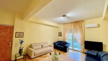 Apartamento | Área de estar | TV de tela plana