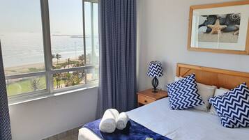 Apartamento Familiar, 1 quarto | 2 quartos, roupa de alta qualidade, secretária, ferro/tábua de engomar