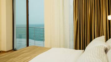 Suite Deluxe | 1 quarto, roupa de alta qualidade, camas de colchão Select Comfort