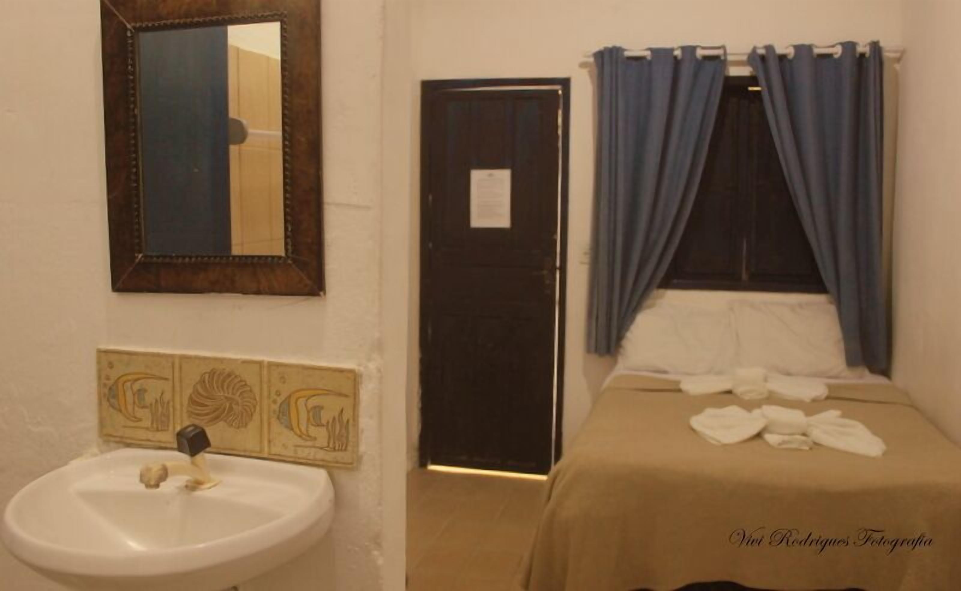 Quarto quádruplo básico | Frigobar, berços (sobretaxa), Wi-Fi de cortesia, roupa de cama