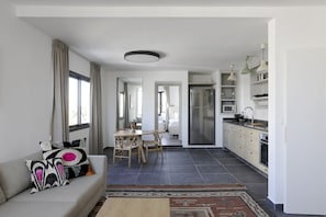 Quarto casal luxo | Área de estar