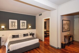 Suite Júnior | Minibar, cofre no quarto, cortinas/cortinados opacos