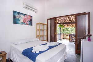 Quarto triplo | Frigobar, Wi-Fi de cortesia, roupa de cama