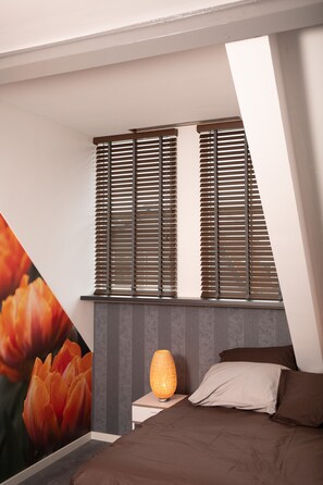 Quarto triplo superior, 1 cama Queen e sofá-cama, banheira | Comodidades do quarto