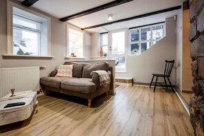 Apartamento, 1 quarto, no piso térreo (101) | Área de estar | TV de tela plana