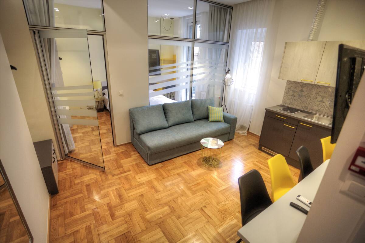 Apartamento conforto | Sala de estar | TV de tela plana