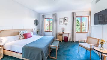 Suíte júnior | 1 quarto, frigobar, cofres nos quartos, cortinas blackout