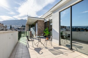 Suíte júnior, terraço, vista para a cidade | Terraço/pátio