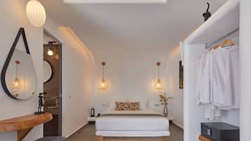 Suíte família, banheira de hidromassagem | 1 quarto, frigobar, cofres nos quartos, individualmente decorados