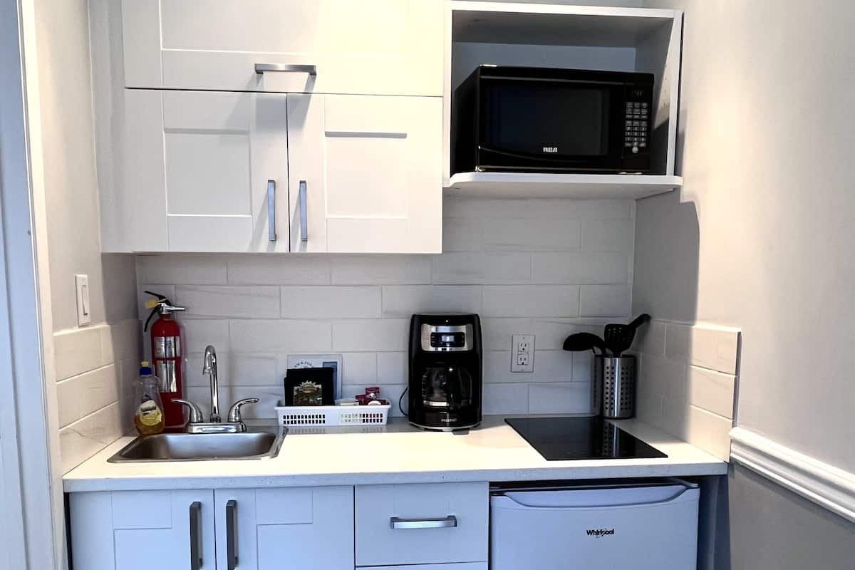 Cozinha privada | Uma cafeteira/bule, uma chaleira elétrica