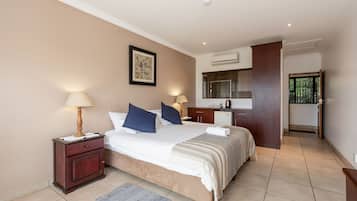 Quarto | Frigobar, cofres nos quartos, escrivaninha