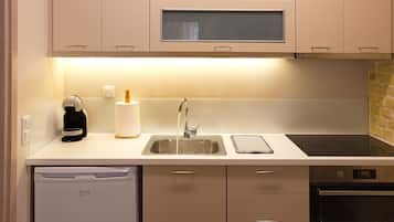 Apartamento, 1 quarto | Cozinha privada | Um frigorífico/congelador grande, um forno, uma placa de cozinha