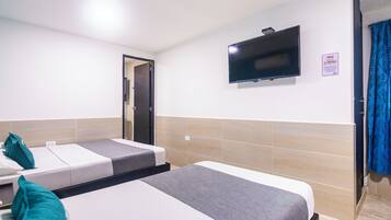 Quarto triplo | Roupas de cama antialérgicas, Wi-Fi de cortesia, roupa de cama