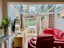 Casa | Área de estar | TV, livros