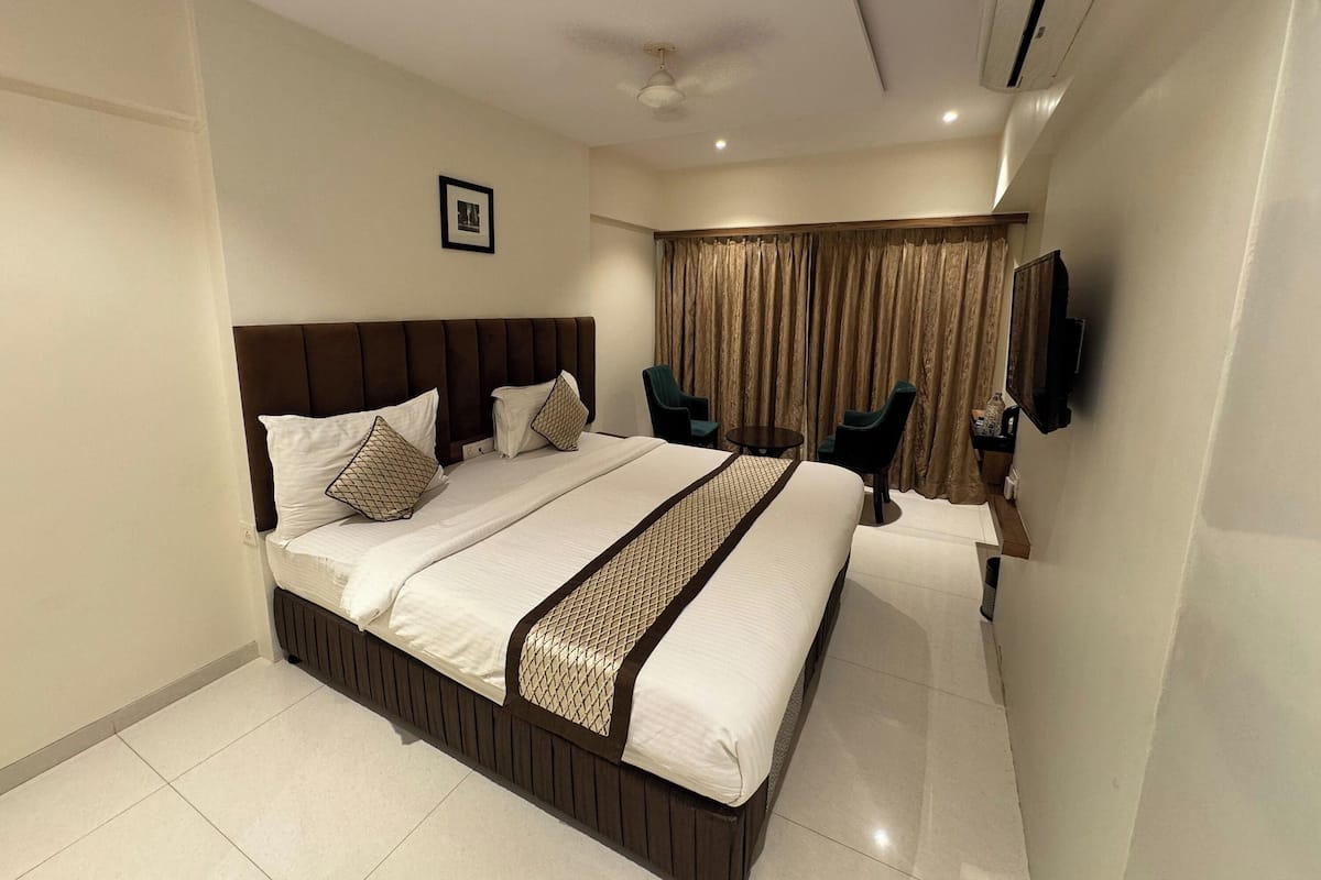 Quarto premium | 1 quarto, escrivaninha, espaço de trabalho para notebook