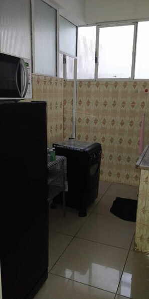 AP10 | Cozinha privada | Um frigorífico, um micro-ondas, um forno, liquidificador 