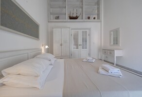 Apartamento premium (12) | Lençóis italianos Frette, roupas de cama premium, edredons de pluma
