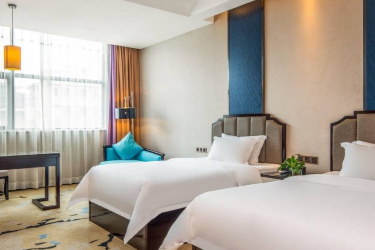 Quarto Twin Exclusivo | 1 quarto, secretária, cortinas/cortinados opacos, Wi-fi grátis