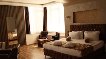 Quarto presidencial | Roupas de cama premium, frigobar, cofres nos quartos, escrivaninha