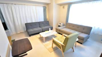 Apartamento, 1 quarto | Sala | TV de ecrã plano