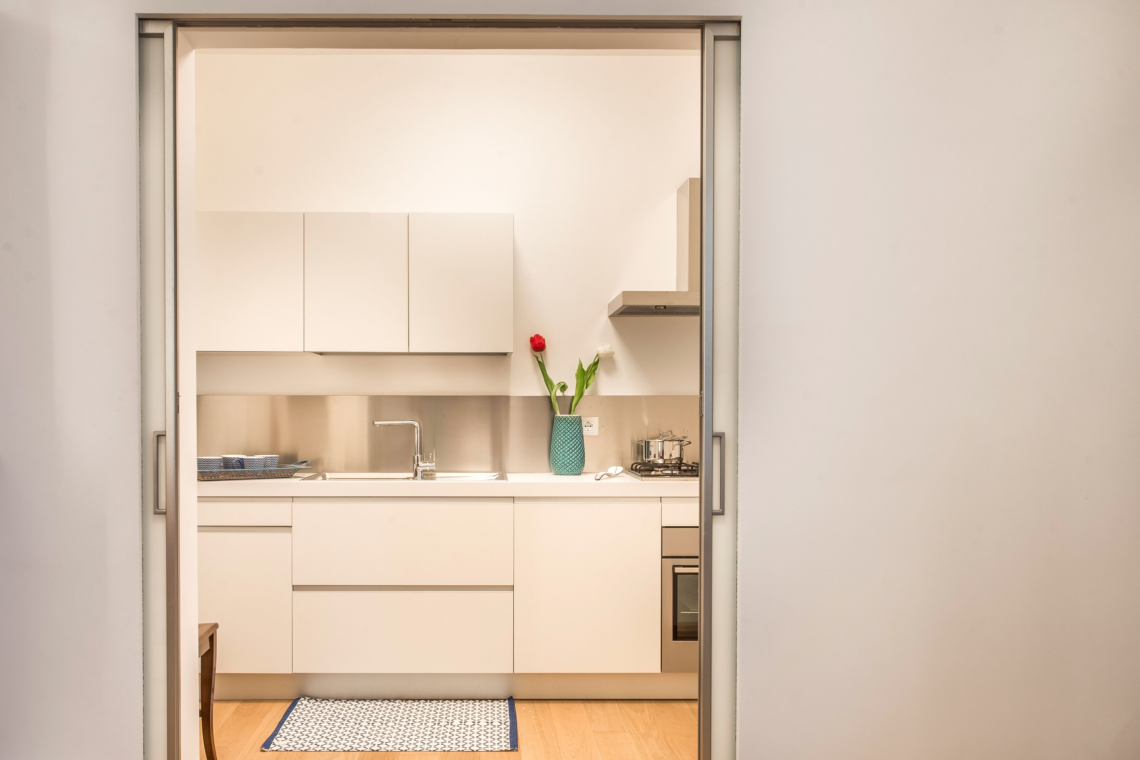 Apartamento, 3 quartos | Cozinha privada | Geladeira grande, fogão, cooktop, lava-louças