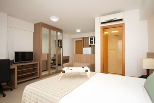 Apartamento básico | Wi-Fi de cortesia, roupa de cama