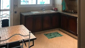 Apartamento, 3 quartos | Cozinha privada