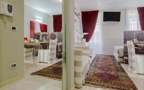 Estúdio | Sala de estar | TV de ecrã plano