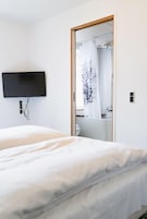 Lille dobbeltværelse | Roupas de cama premium, edredons de pluma, camas com colchões pillow-top