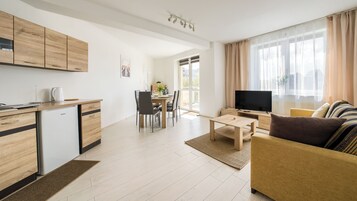 Apartamento (7B/3) | Área de estar | TV de tela plana