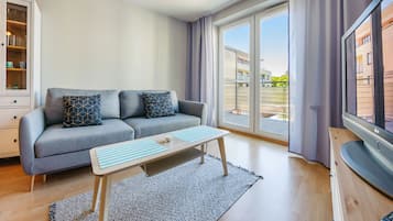Apartamento (30A) | Área de estar | TV de tela plana