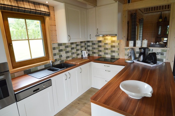 Chalé | Cozinha privada | Uma cadeira de bebé