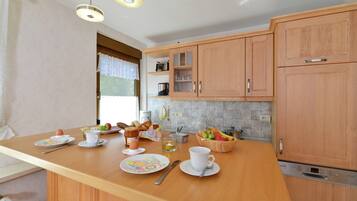 Apartamento | Cozinha privada | Cadeirão de bebê