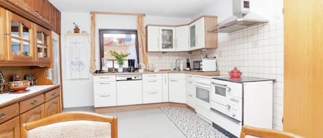 Apartamento | Cozinha privada | Cadeirão de bebê