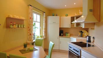 Apartamento | Cozinha privada | Cadeirão de bebê