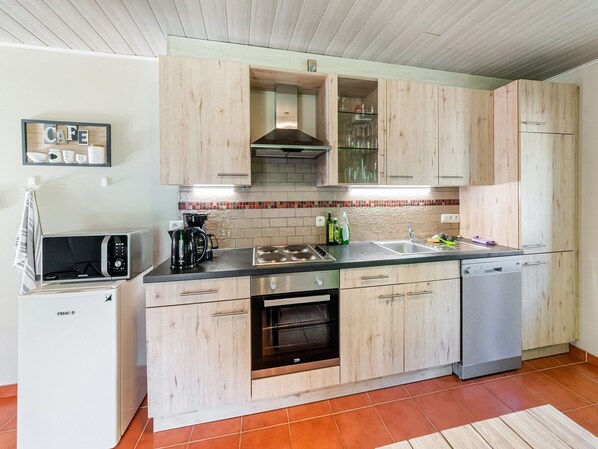 Casa | Cozinha privada | Uma cadeira de bebé