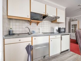 Apartamento | Cozinha privada | Cadeirão de bebê