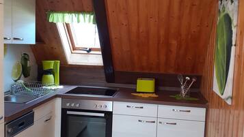 Apartamento | Cozinha privada | Cadeirão de bebê