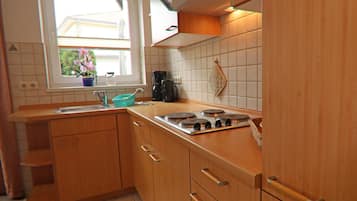 Apartamento | Cozinha privada | Cadeirão de bebê