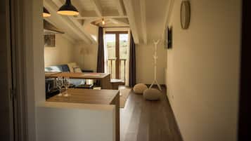 Apartamento, 1 quarto, banheira de hidromassagem | Área de estar | Smart TV