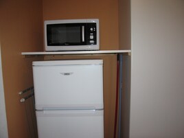 Apartamento | Cozinha privada | Uma cadeira de bebé 