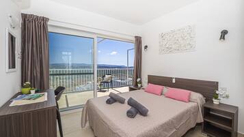 Apartamento, 3 quartos | 3 quartos, secretária, cortinas/cortinados opacos