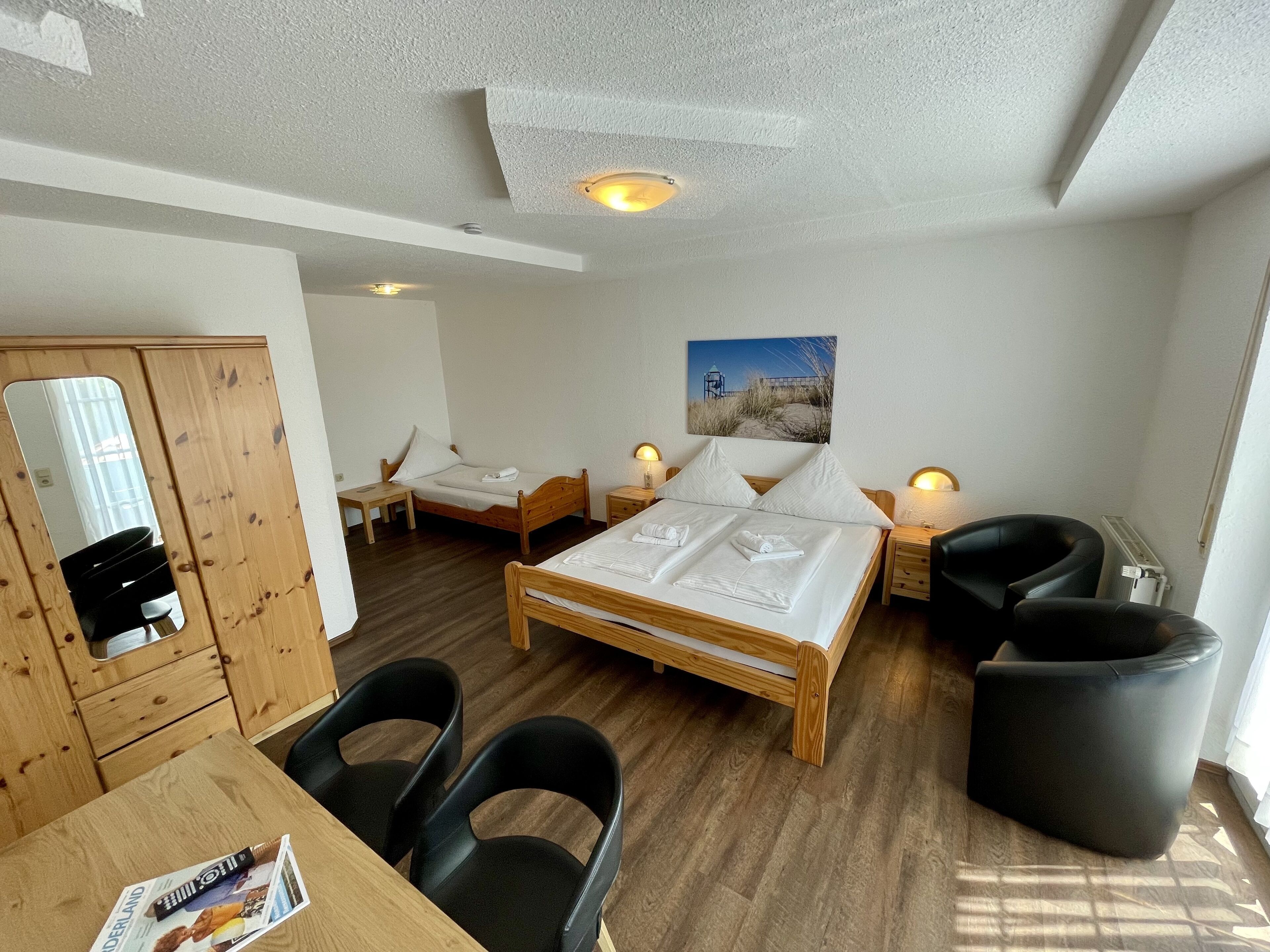 Quarto triplo standard, banheiro privativo | Comodidades do quarto