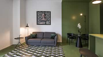 Apartamento Design em Condomínio Fechado, 1 quarto | Sala | Televisor de ecrã plano de 42 polegadas com canais via satélite