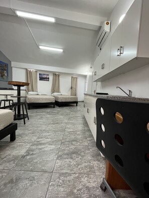 Quarto Triplo Familiar, 1 quarto | Cortinas/cortinados opacos, quartos insonorizados