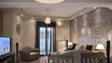 Apartamento Cidade | Sala | Smart TV de 50 polegadas com canais via satélite, televisor