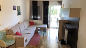 Apartamento, 2 quartos, vista para o mar | Sala